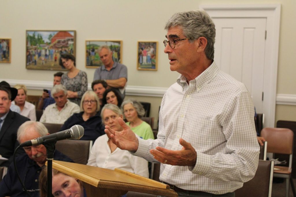 Airport officials, opponents spar again during rowdy hearing on ...